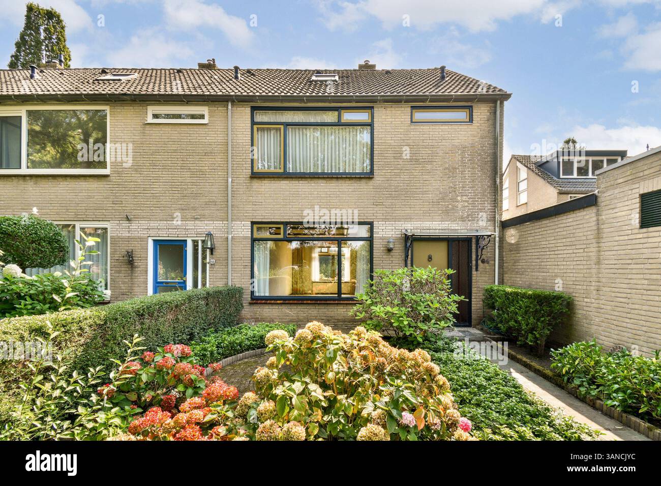 A beautiful suburban house featuring a modern architecture style, set ...