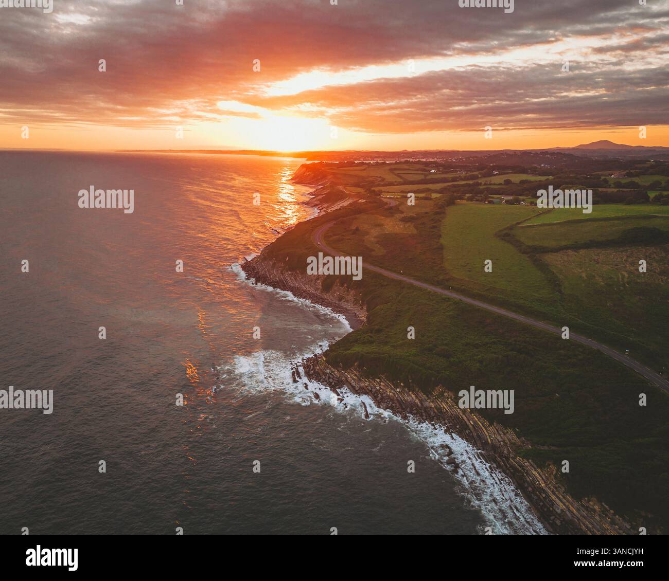 Aerial View of the Corniche Basque road at sunrise, French Basque ...