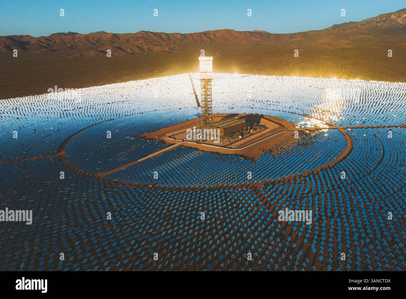 Aerial view of a concentrated solar thermal plant at sunrise, Mojave ...
