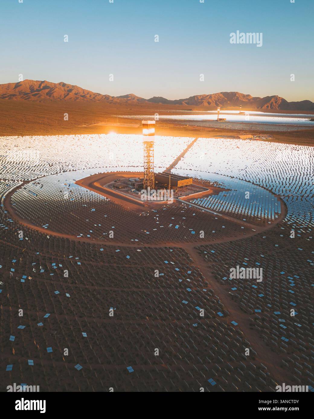 Aerial view of a concentrated solar thermal plant at sunrise, Mojave ...