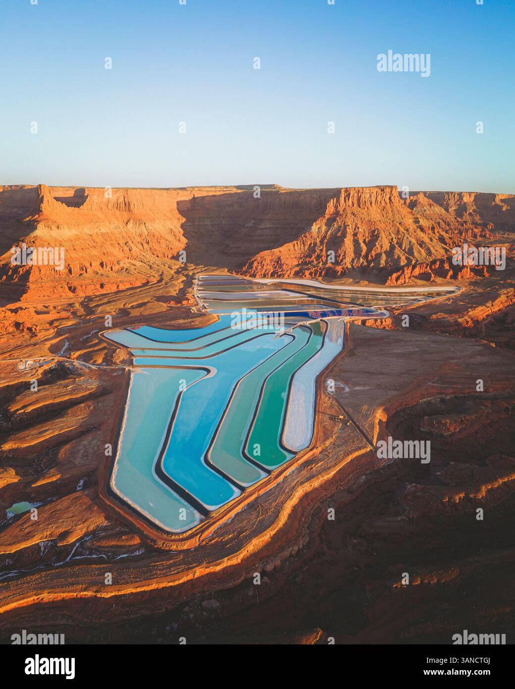Aerial view of colorful Potash Ponds at sunrise, near Moab, Utah ...