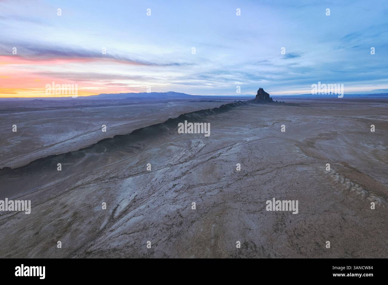 Aerial view of the famous monadnock Shiprock at sunset, Navajo Nation ...