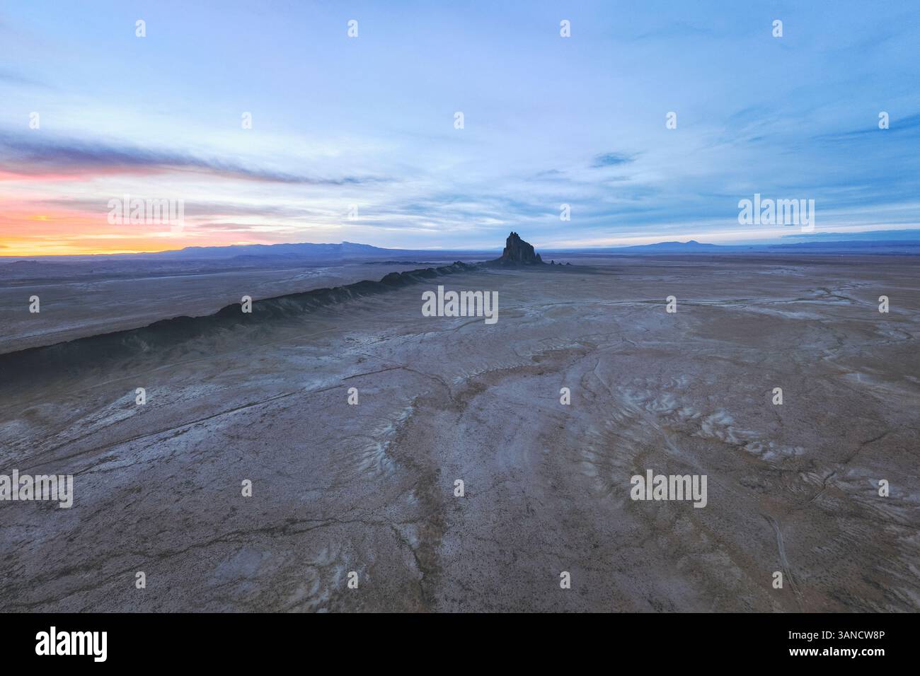 Aerial view of the famous monadnock Shiprock at sunset, Navajo Nation ...