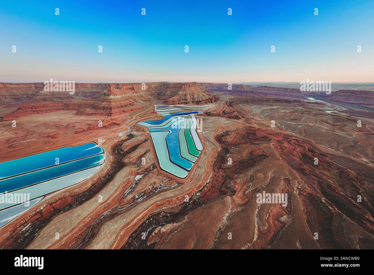 Aerial view of colorful Potash Ponds at sunrise, near Moab, Utah ...