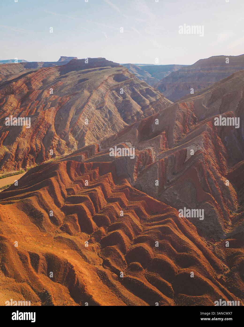 Aerial view of triangular shaped rocks along San Juan River, near ...