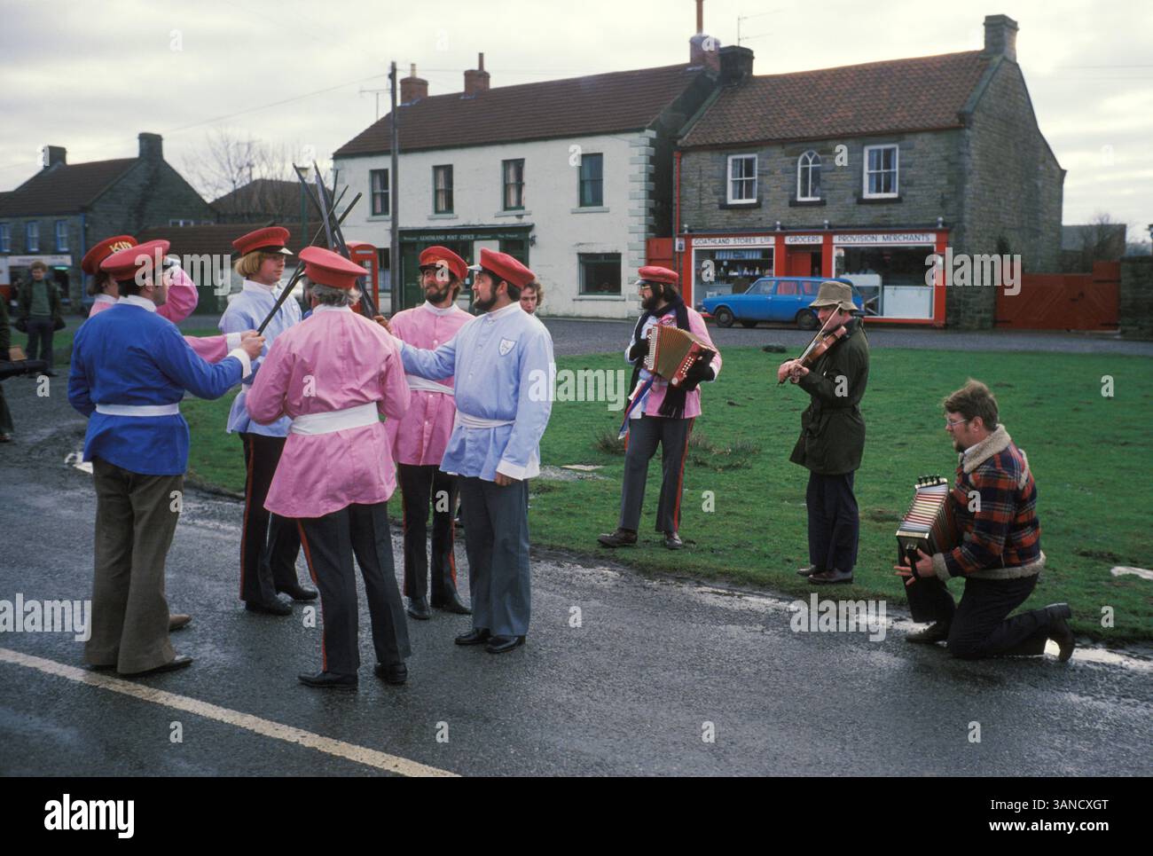 Goathland Plough Stots. The Longsword Dance team dancing in the centre ...