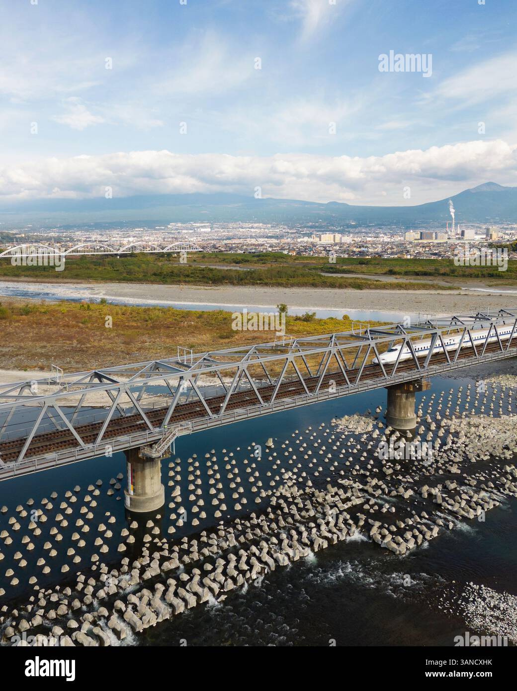 Aerial view of the Tokaido Shinkansen on a bridge over the Fuji-kawa ...