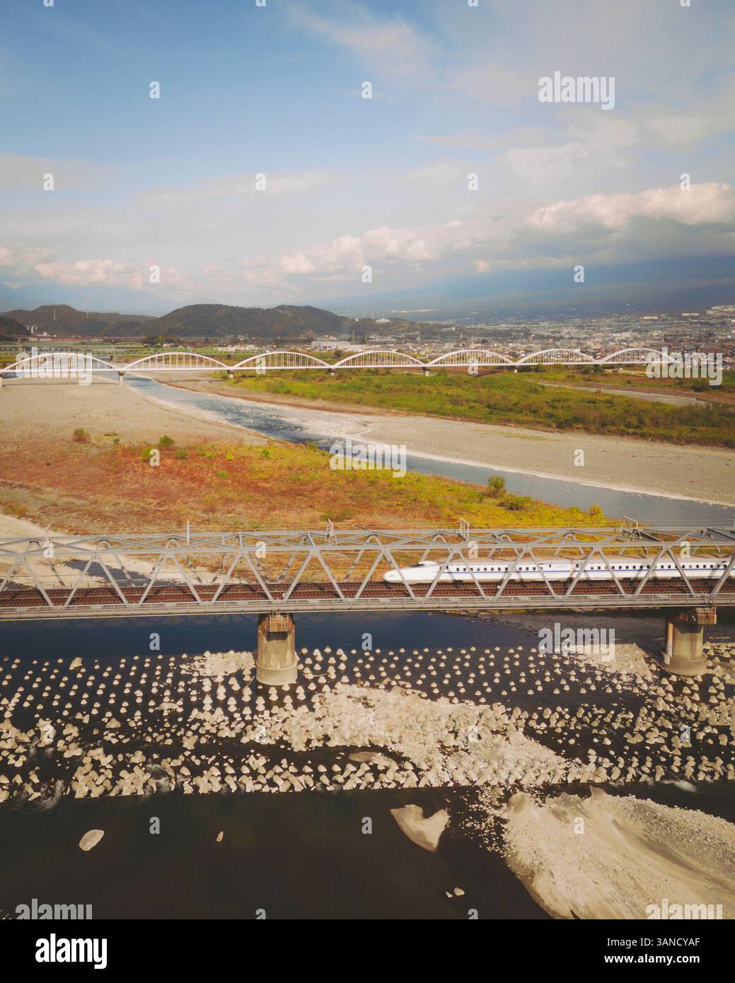 Aerial view of the Tokaido Shinkansen on a bridge over the Fuji-kawa ...