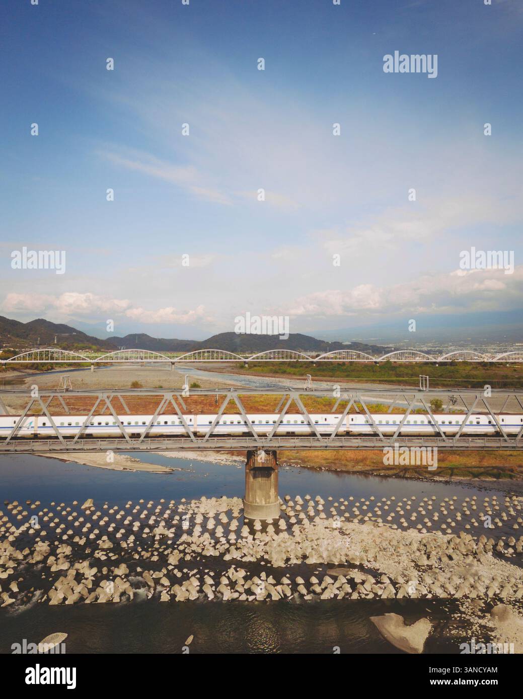 Aerial view of the Tokaido Shinkansen on a bridge over the Fuji-kawa ...