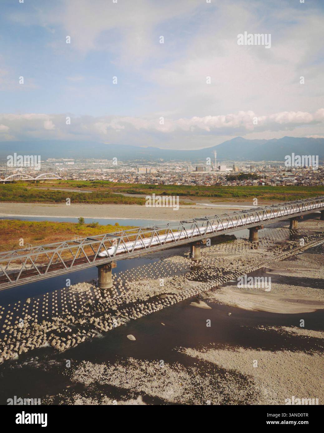 Aerial view of the Tokaido Shinkansen on a bridge over the Fuji-kawa ...