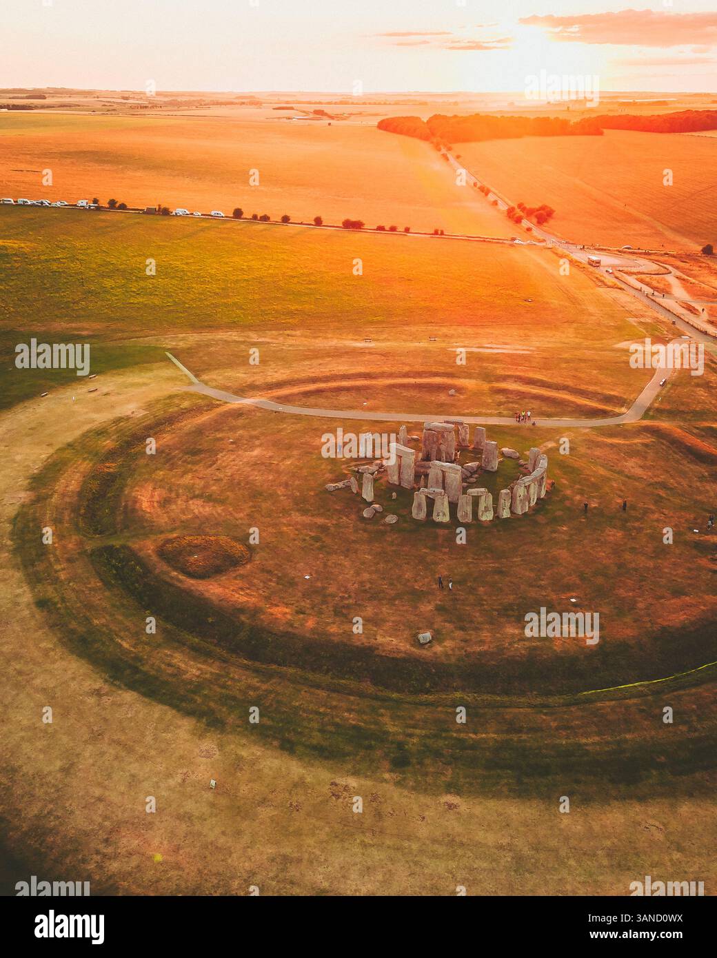 Aerial view of the famous Stonehenge rock sculpture at sunset, England ...