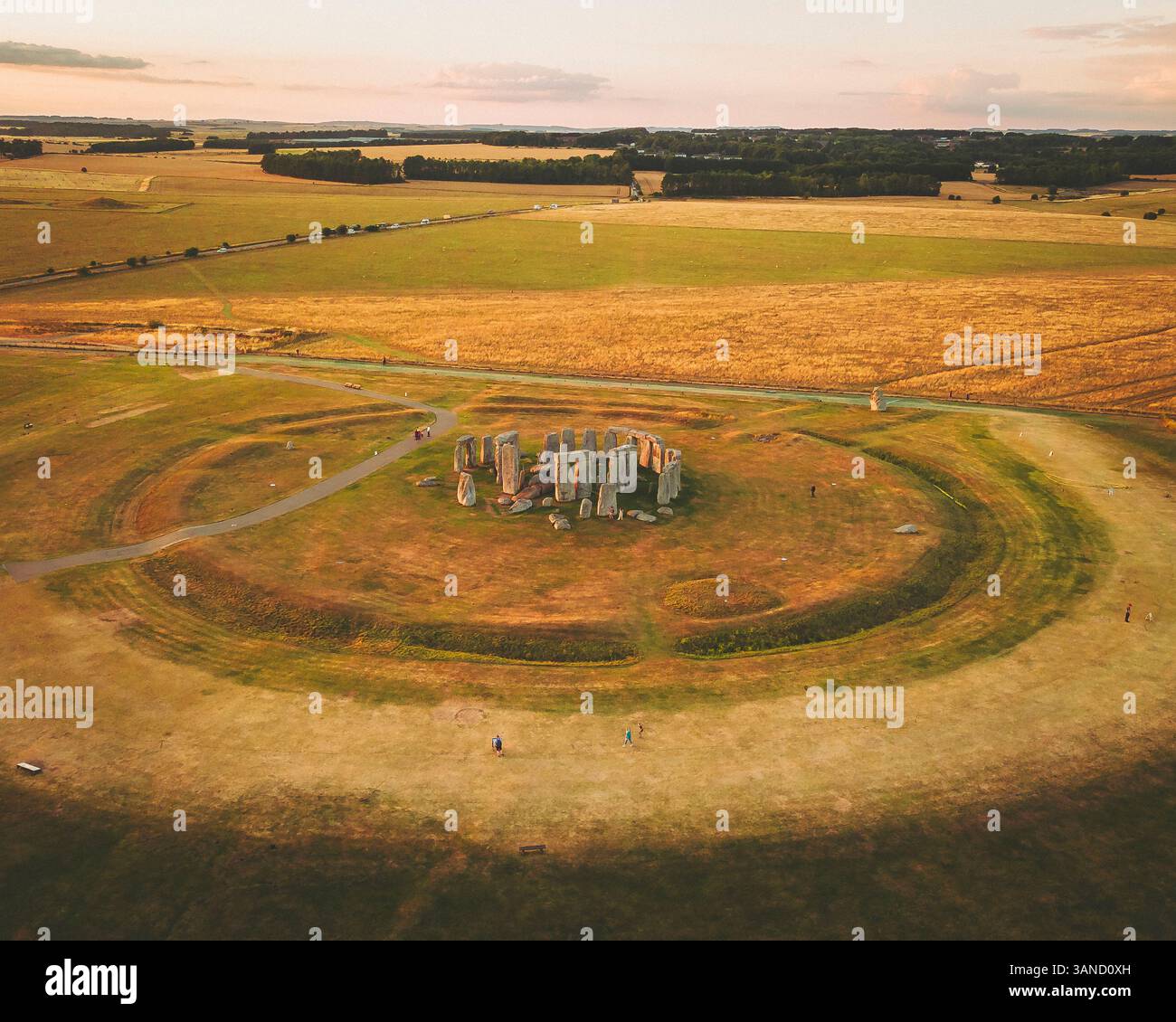 Aerial view of the famous Stonehenge rock sculpture at sunset, England ...