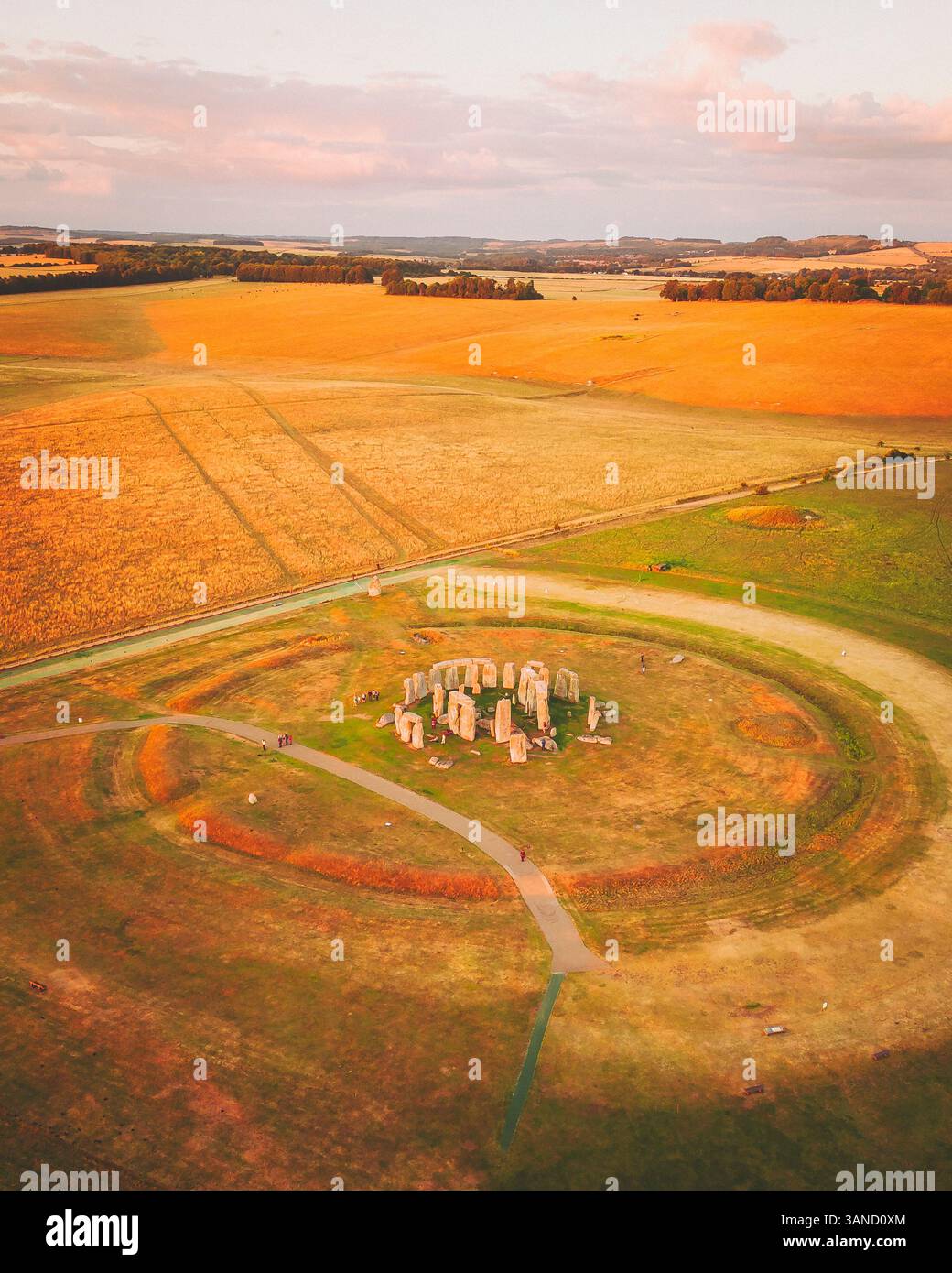 Aerial view of the famous Stonehenge rock sculpture at sunset, England ...