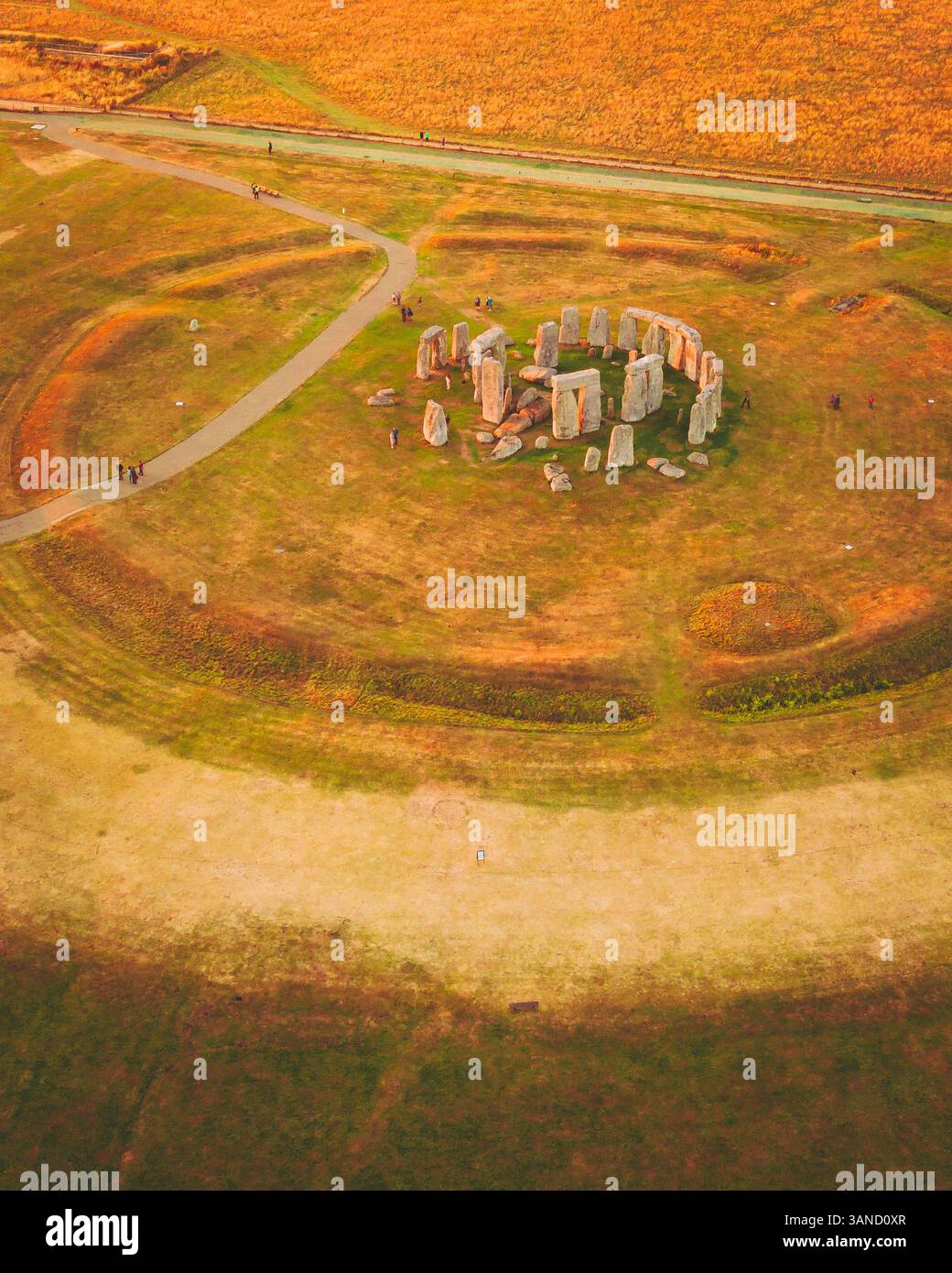 Aerial view of the famous Stonehenge rock sculpture at sunset, England ...