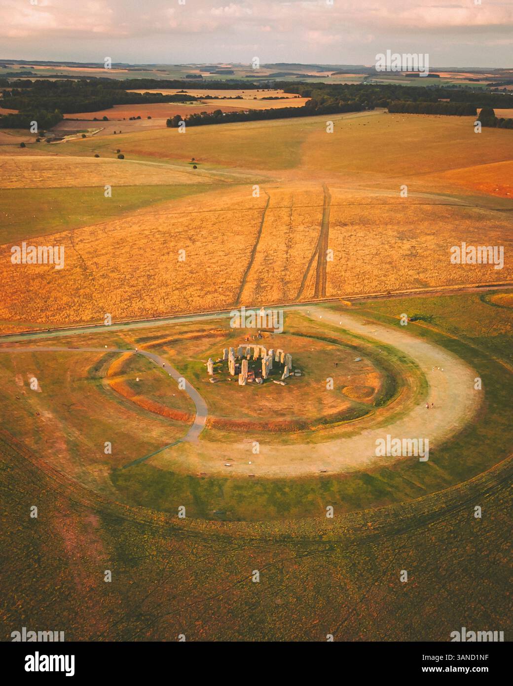 Aerial view of the famous Stonehenge rock sculpture at sunset, England ...