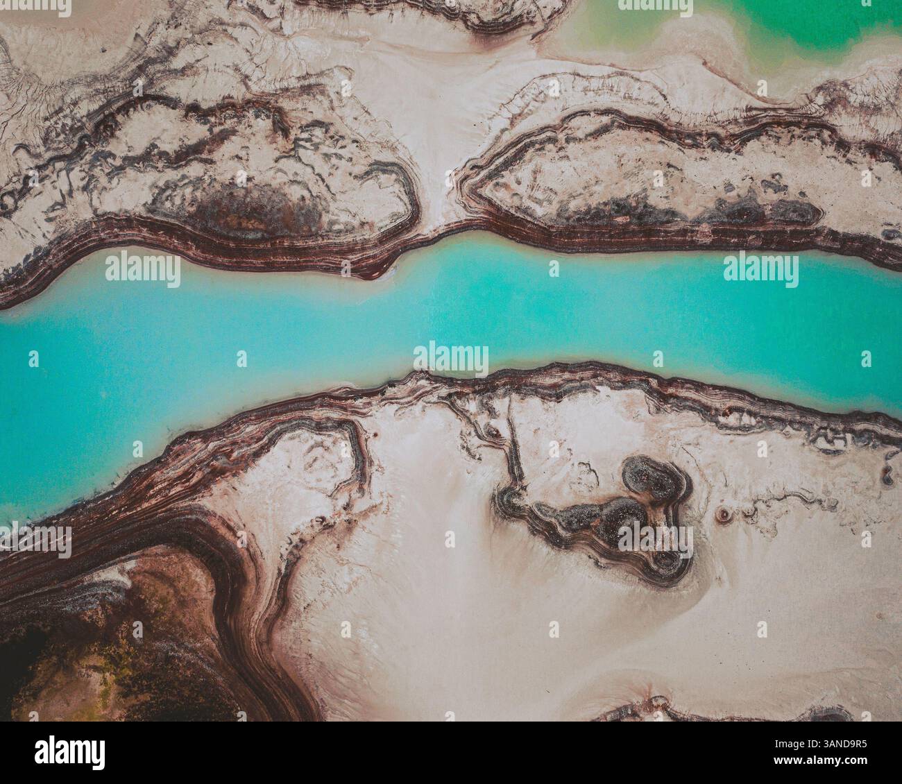 Aerial view of an abstract blue and turquoise clay lake, Art-sur ...