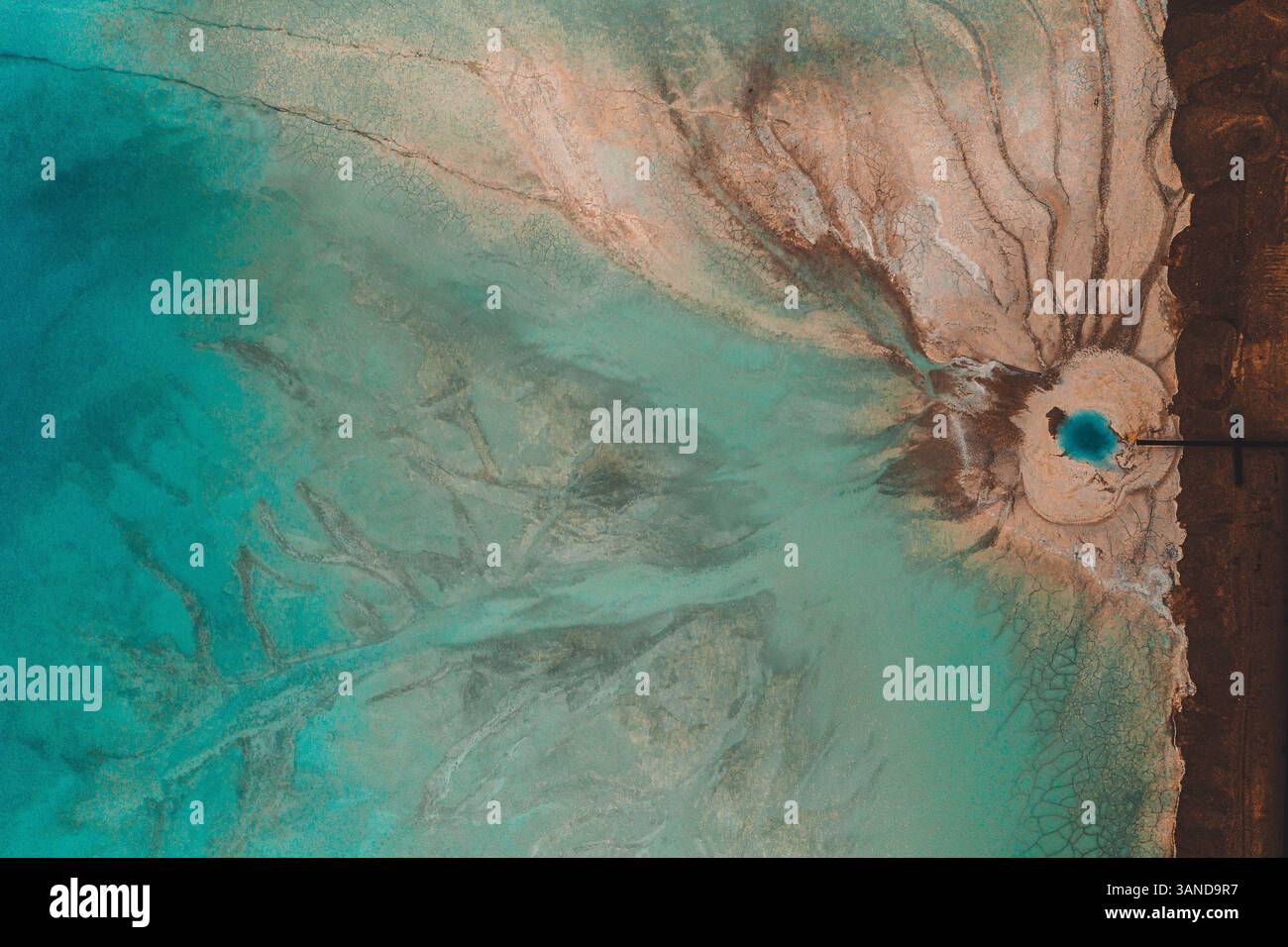 Aerial view of an abstract blue and turquoise clay lake, Art-sur ...