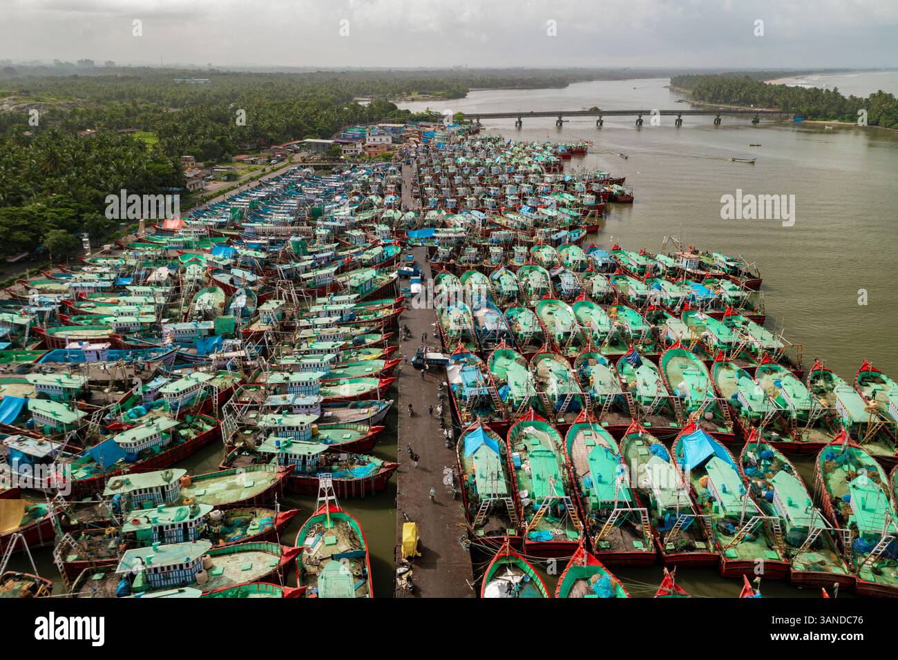 Aerial view of many boats and fishing boats docket at Malpe New Port ...