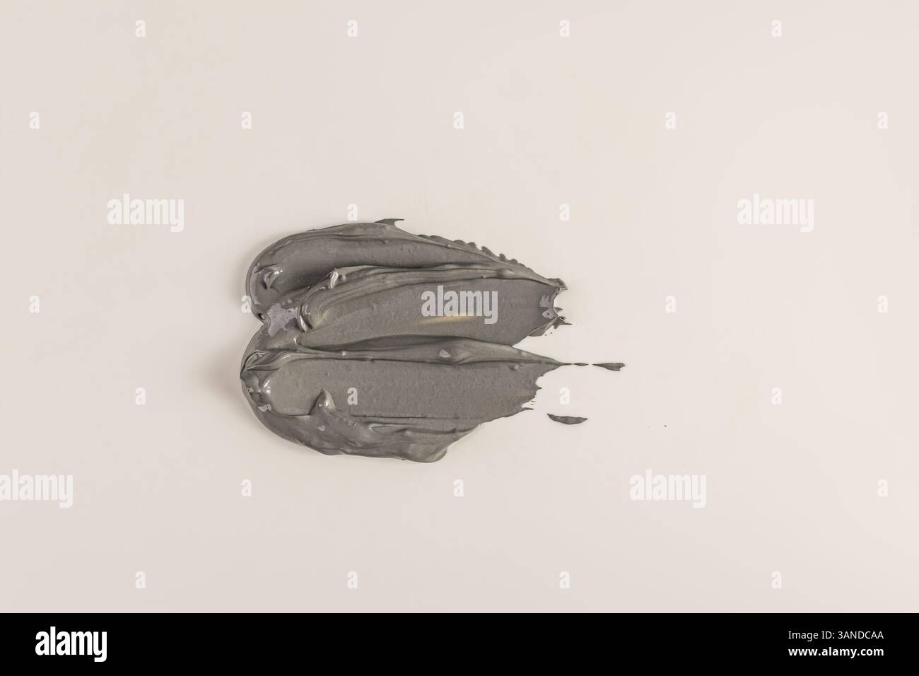 A chic example of the texture of gray, blue natural clay on a pastel ...