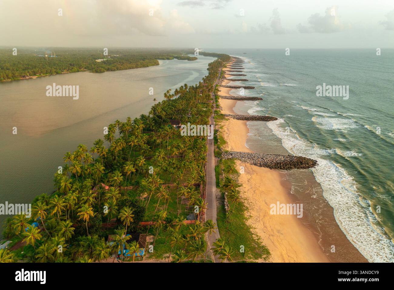 Aerial view of breakwater along a strip of land with Pithrody beach and ...