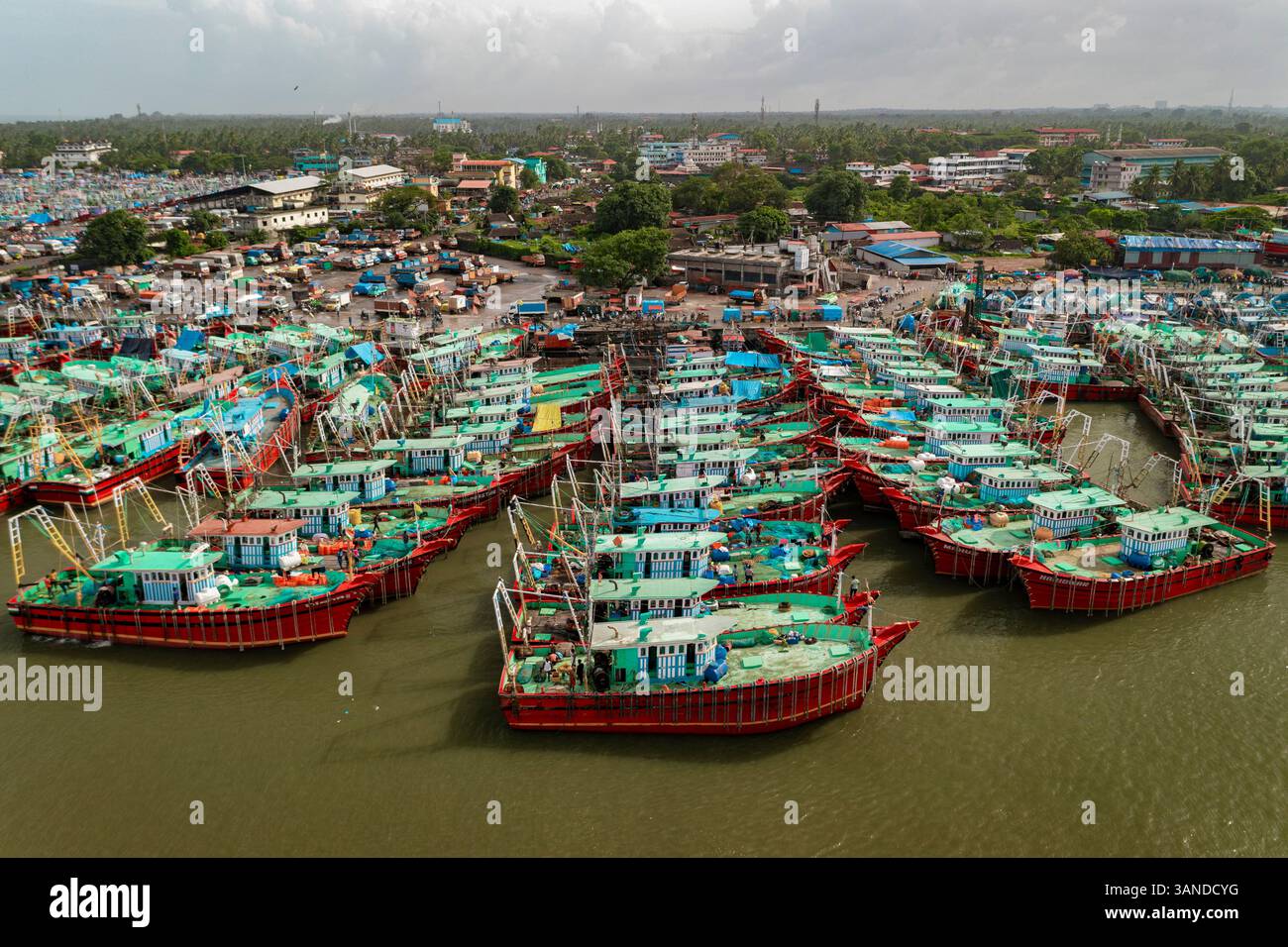 Aerial view of many boats and fishing boats docket at Malpe New Port ...