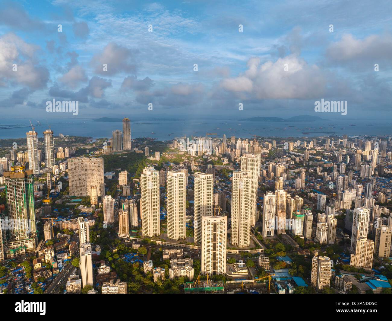 Aerial View of city of Mumbai with skyscrapers and clouds, Mahalakshmi ...