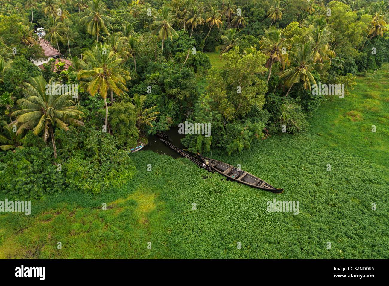 Aerial view of a fisherman with a traditional fishing boat along the ...