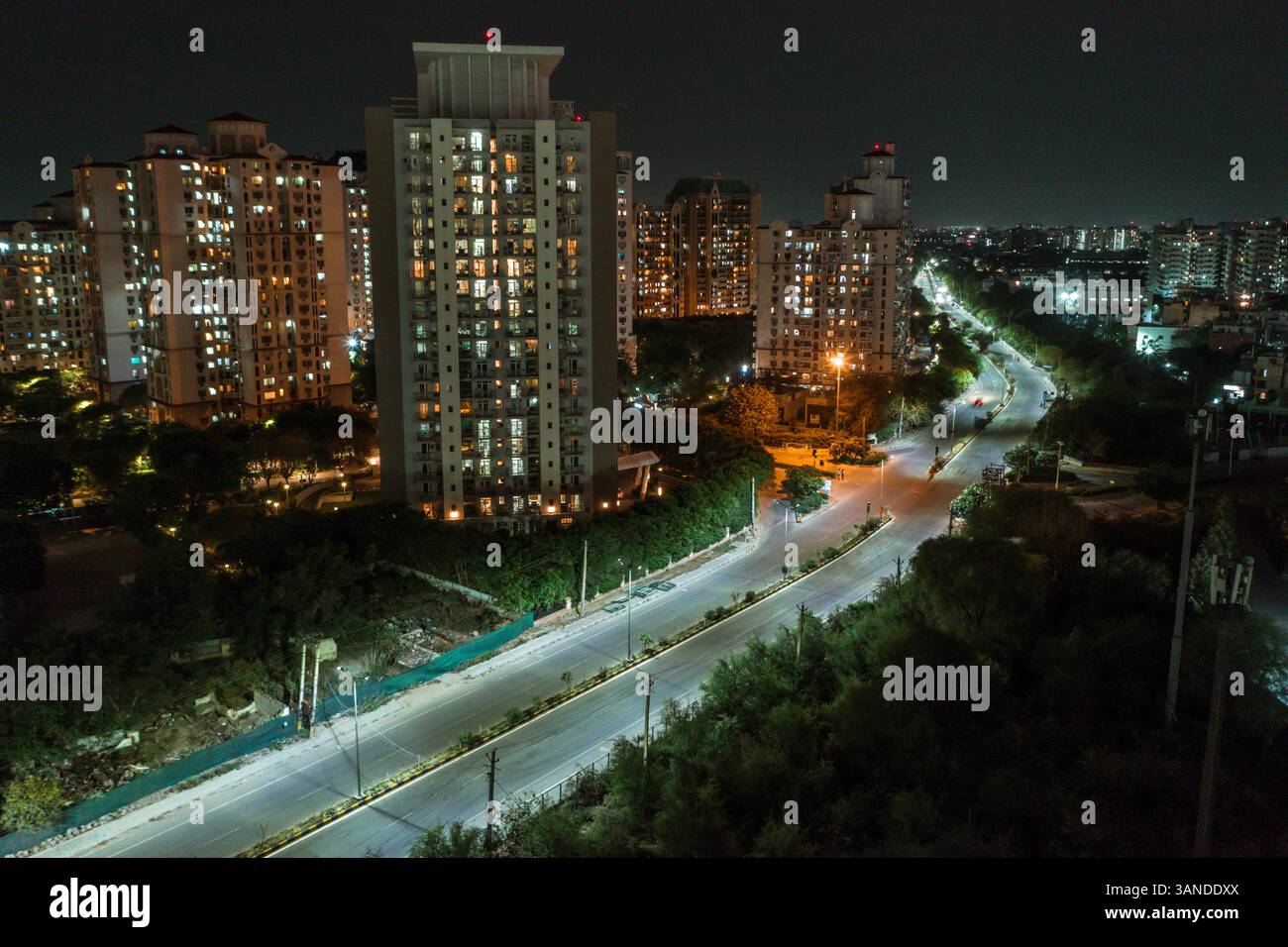 Aerial view of tall skyscraper in Gurugram near the motorway and the ...