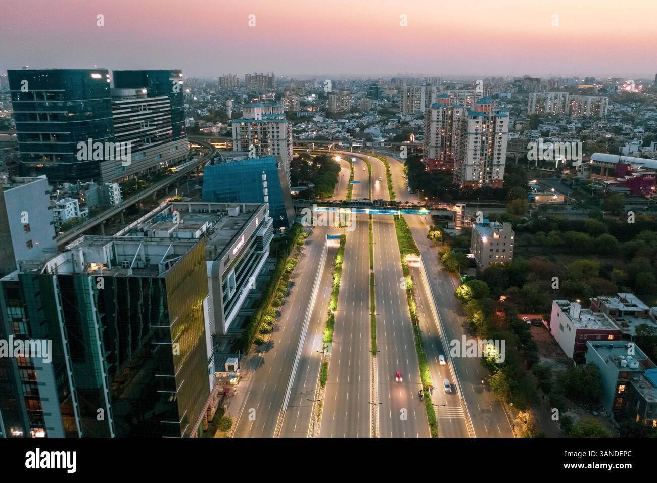 Aerial view of Gurugram financial district with tall building at dusk ...