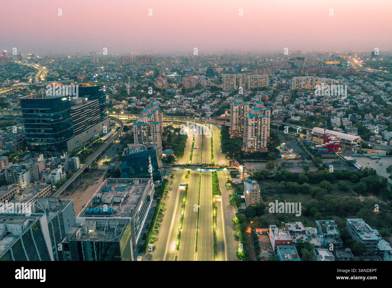Aerial view of Gurugram financial district with tall building at dusk ...