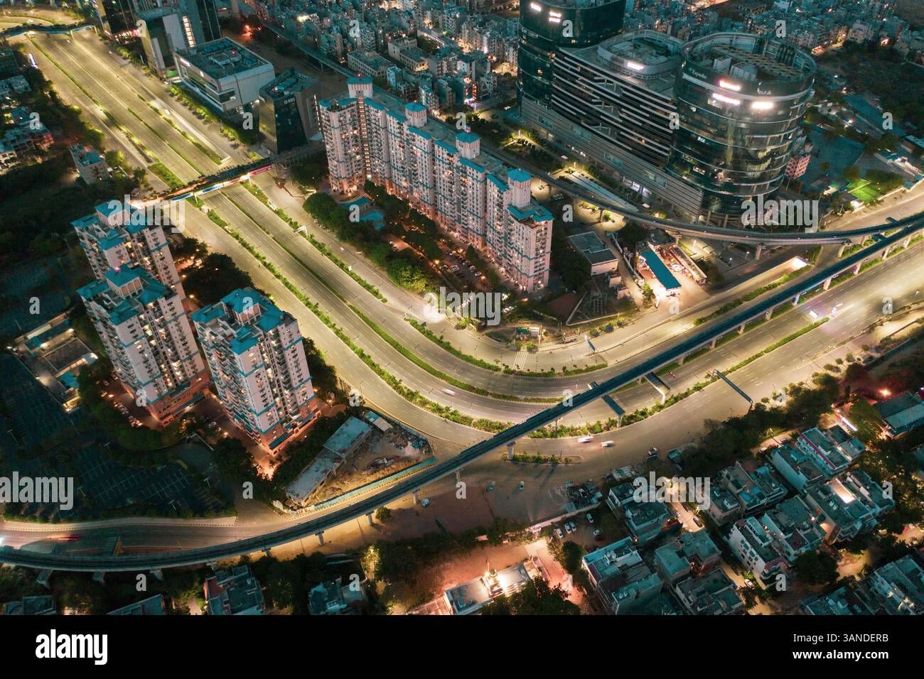 Aerial view of Gurugram financial district with tall building at dusk ...