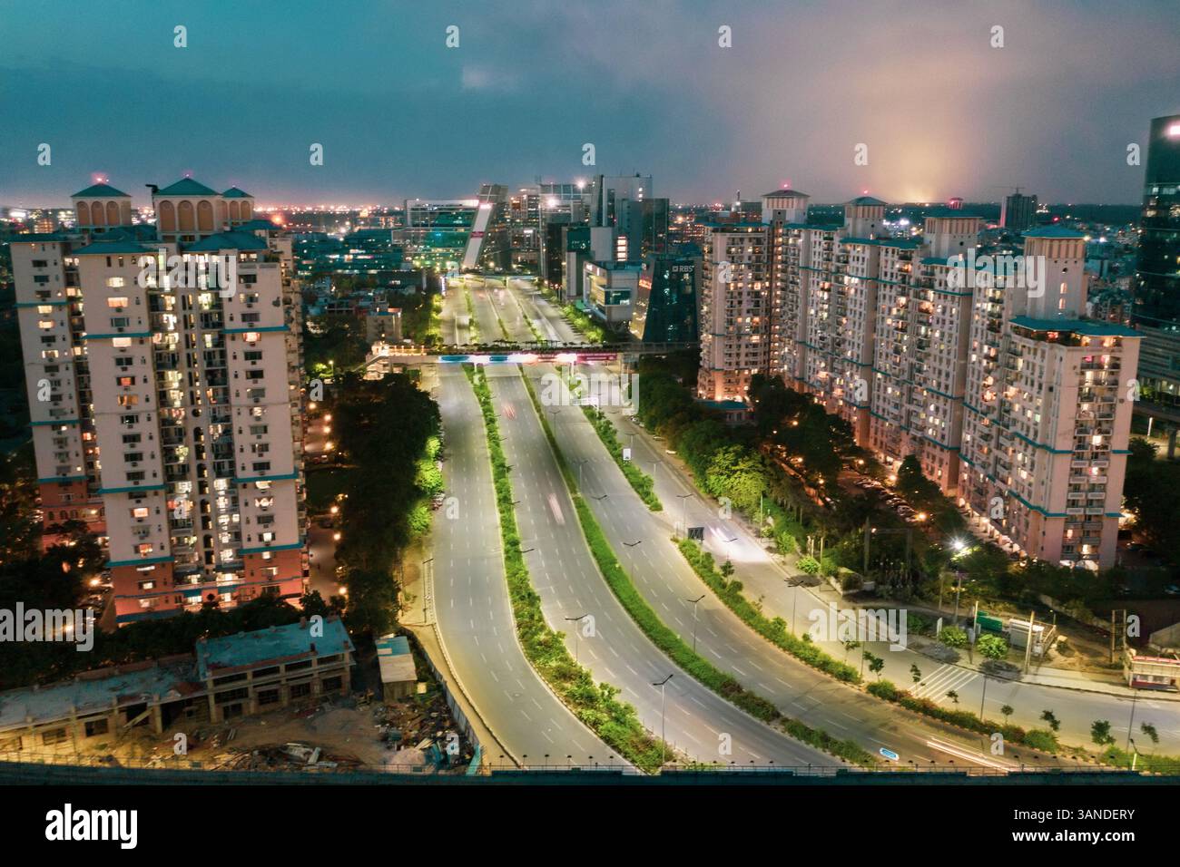 Aerial view of Gurugram financial district with tall building at dusk ...