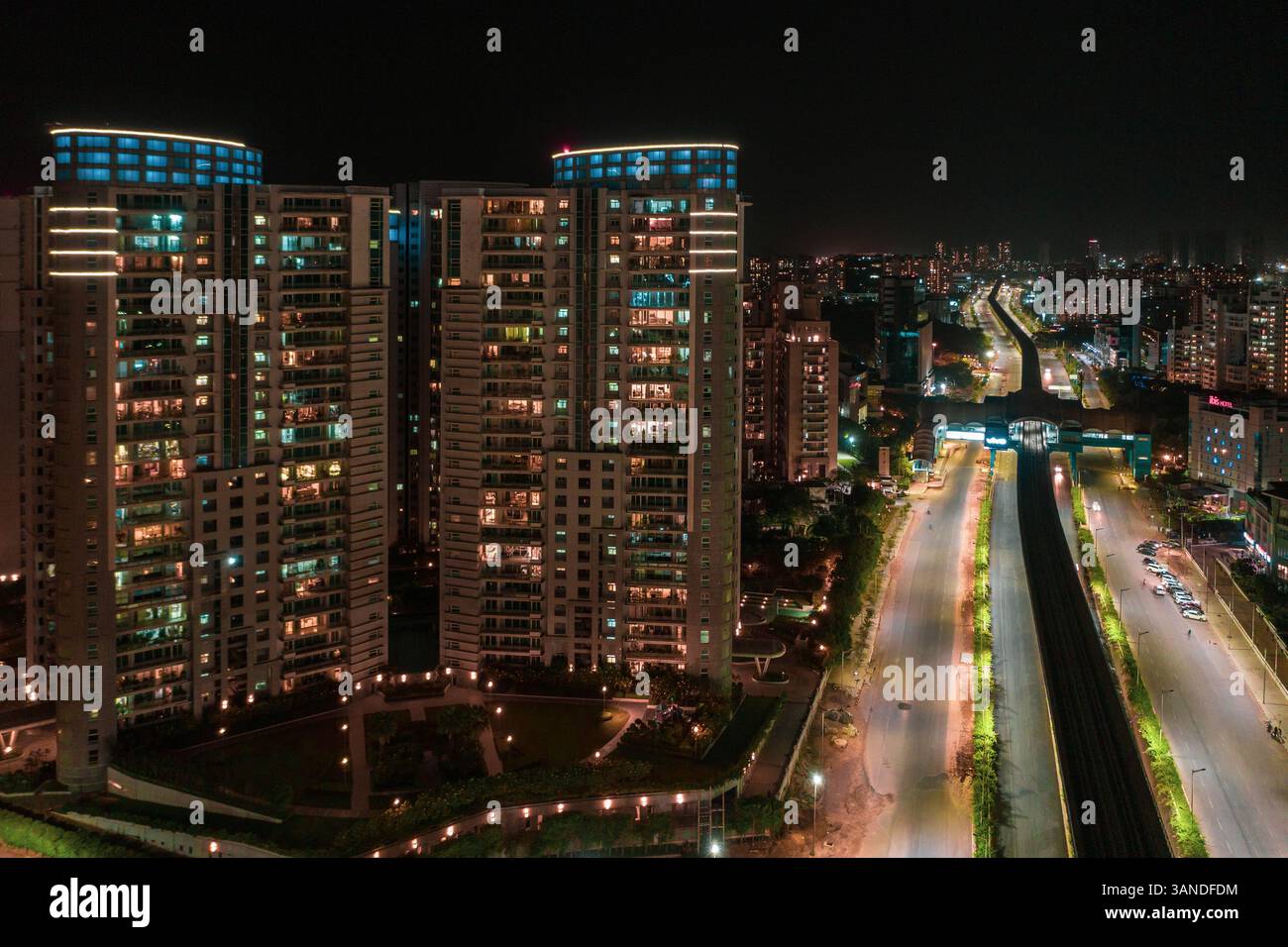 Aerial view of tall skyscraper in Gurugram near the motorway and the ...