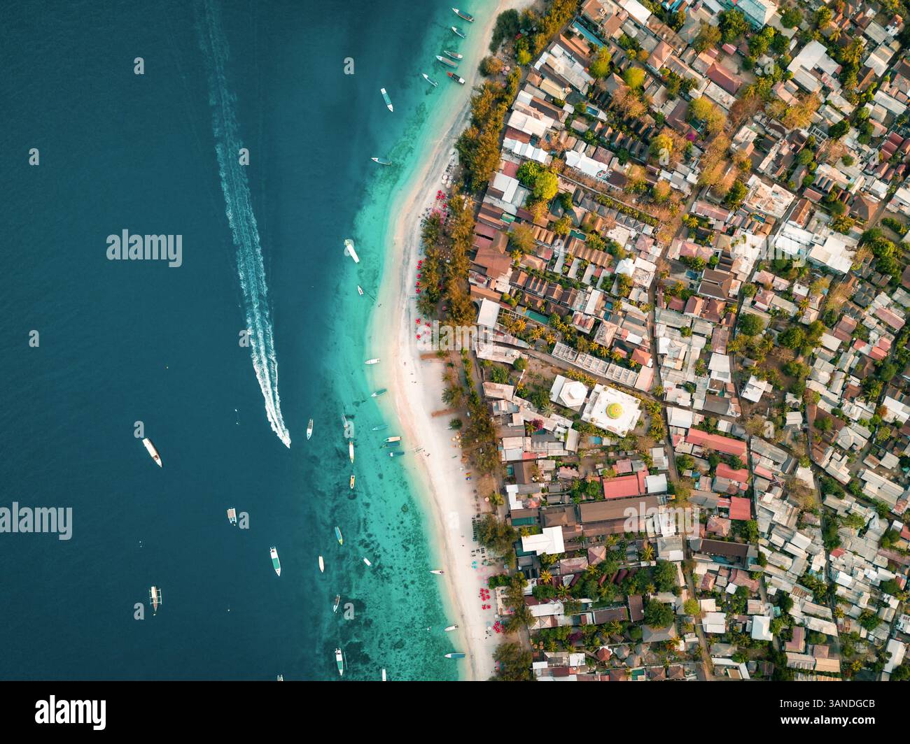 Aerial view of boat sailing near Gili Indah beach, West Nusa Tenggara ...