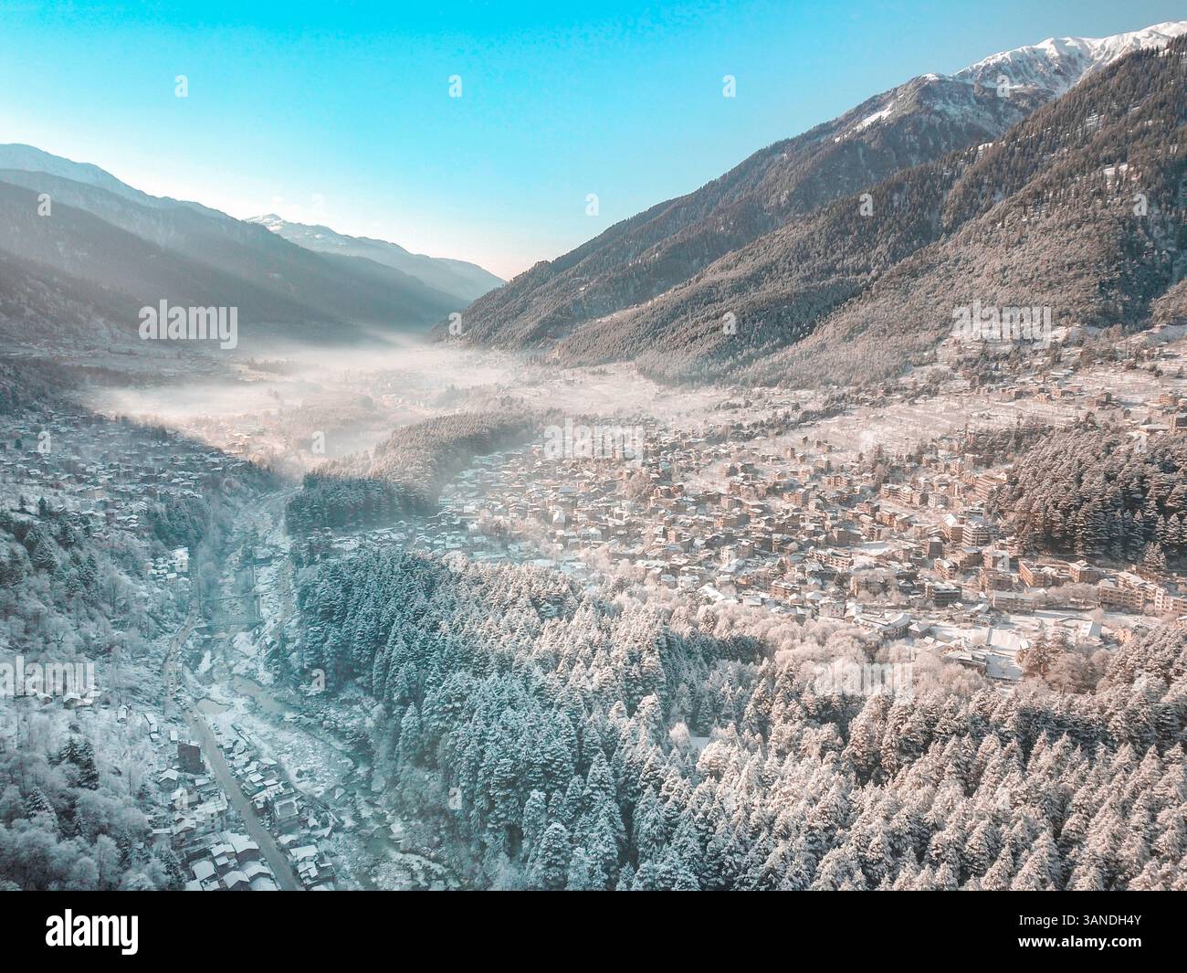 Early morning aerial view of snow-covered Manali city in Himachal ...