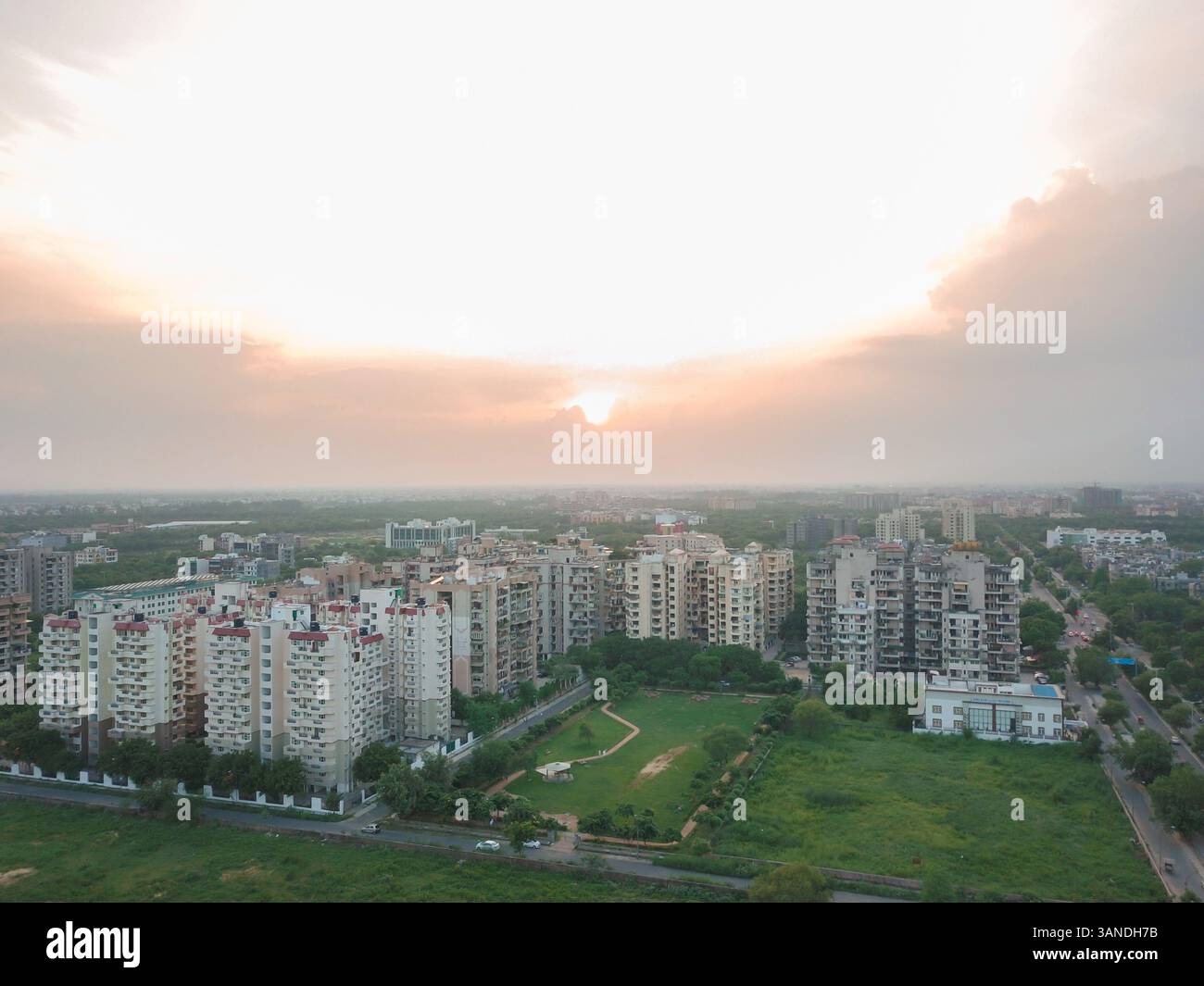 Aerial view of a residential block in dwarka sector 18A during sunset ...