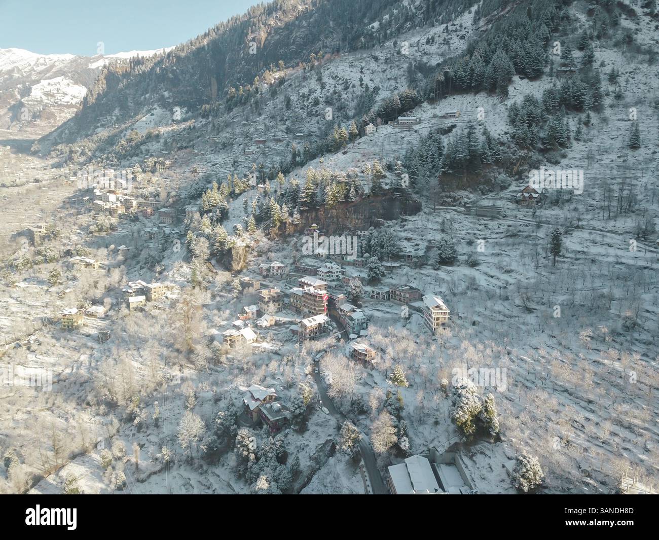 Aerial view of snowfall in the hills of vashisht area of Manali ...