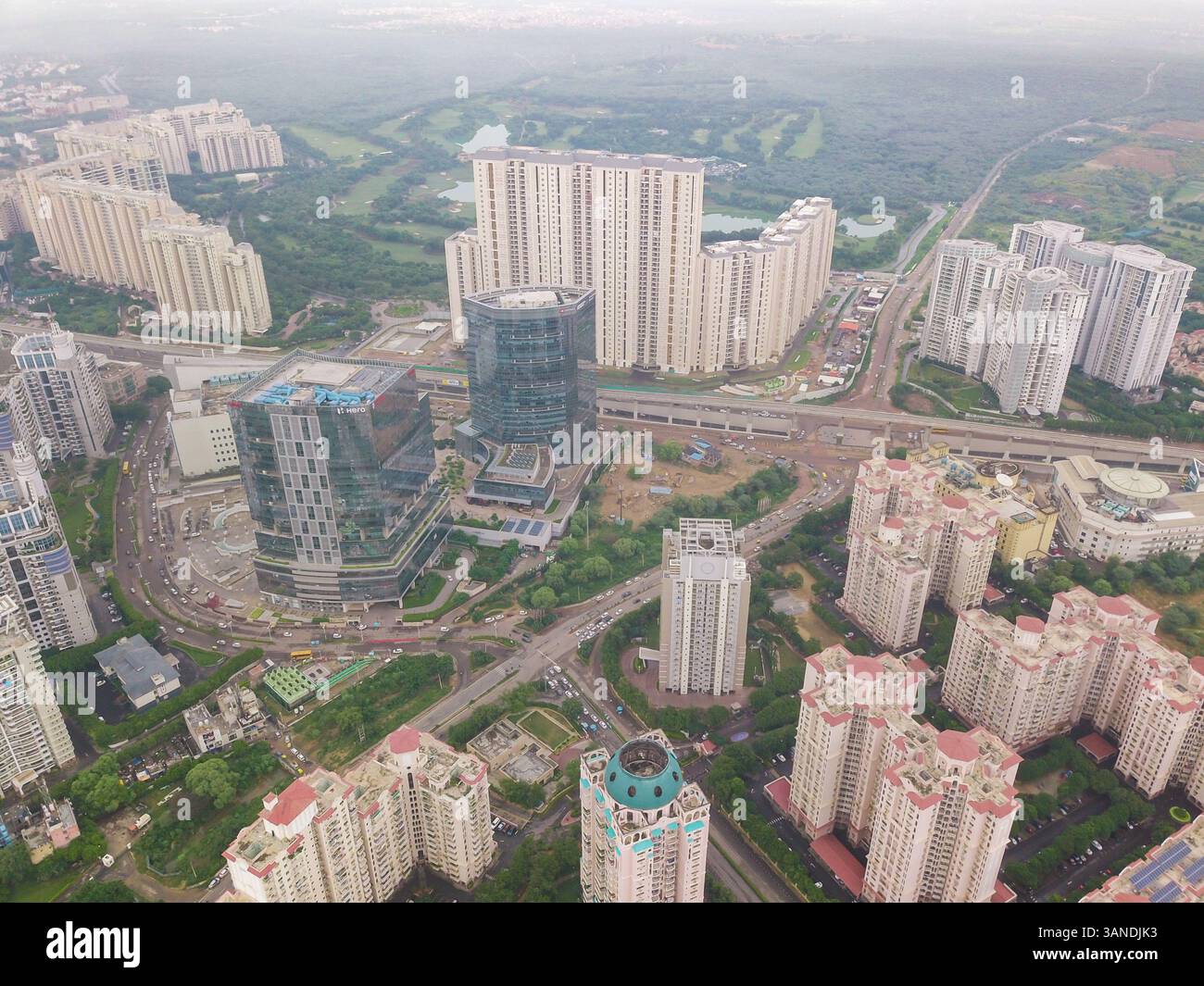 Aerial view of tall residential buildings in DLF City Phase 5 of ...