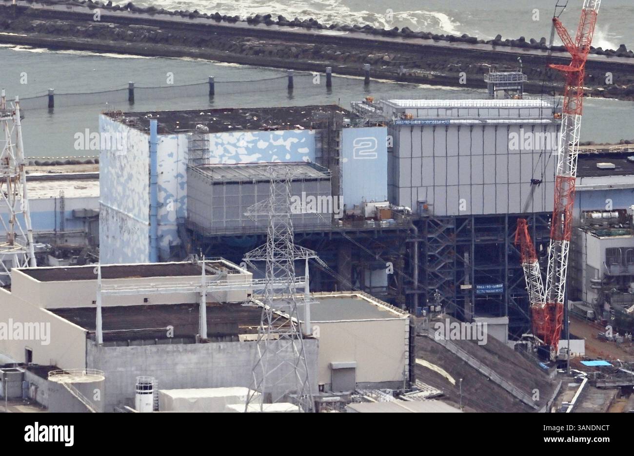 An aerial photo shows Fukushima Daiichi Nuclear Power Plant unit 2 in ...