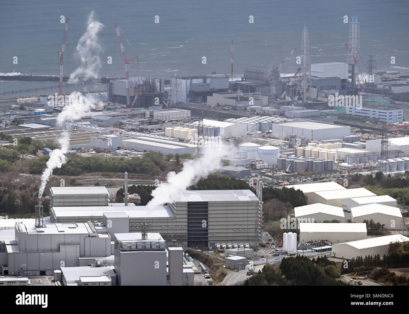An aerial photo shows Fukushima Daiichi Nuclear Power Plant in Okuma ...