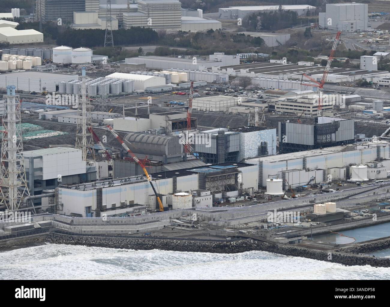 An aerial photo shows Fukushima Daiichi Nuclear Power Plant in Okuma ...