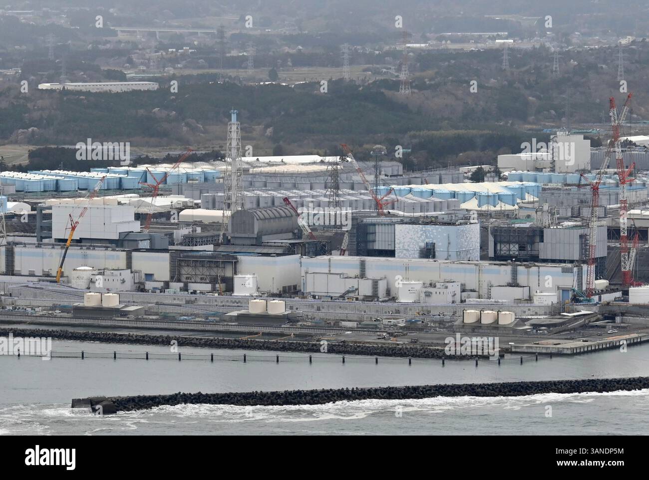 An aerial photo shows Fukushima Daiichi Nuclear Power Plant in Okuma ...