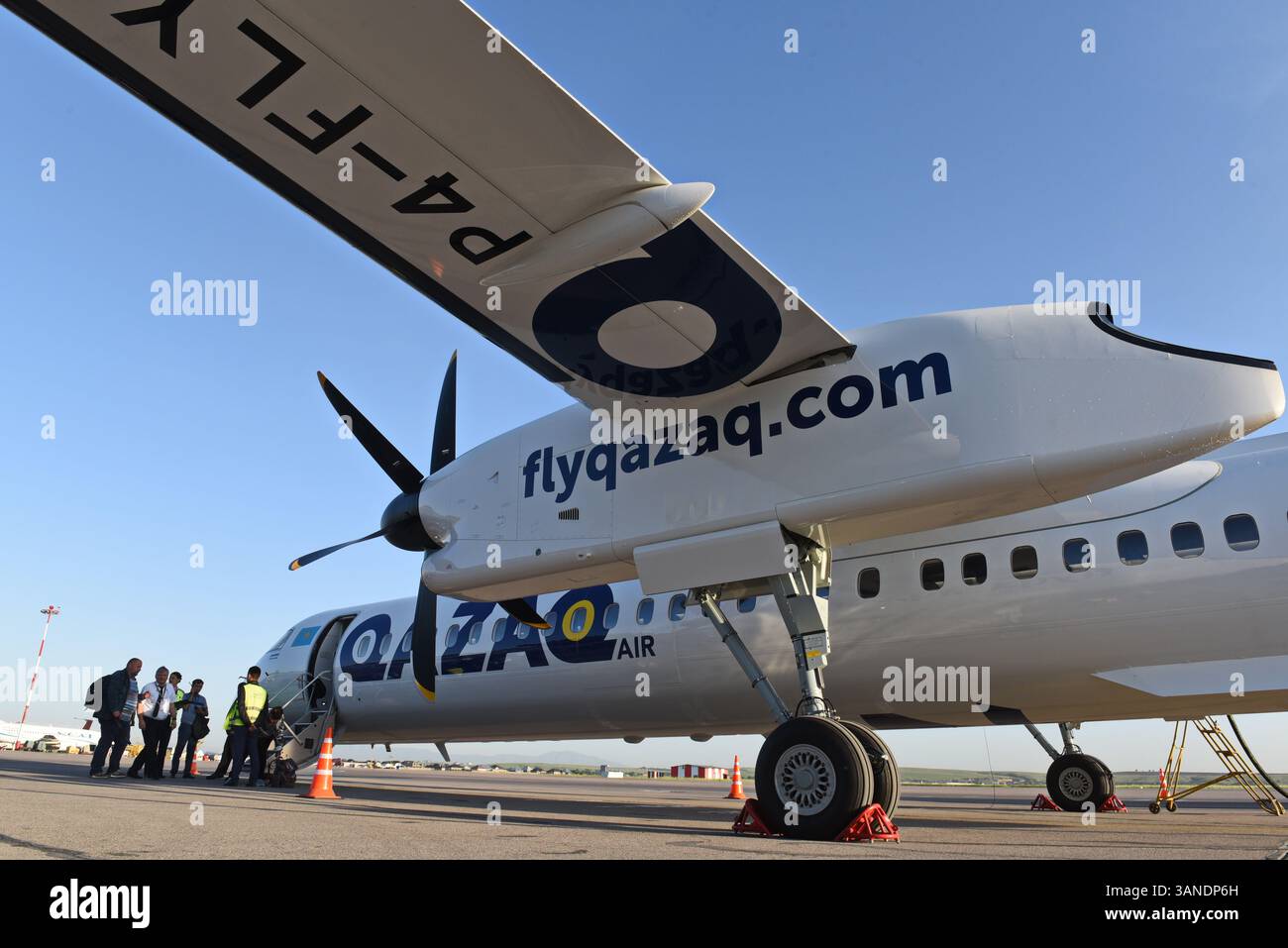 Qazaq Air - Bombardier Q400 Next Gen aircraft at the airport Stock ...