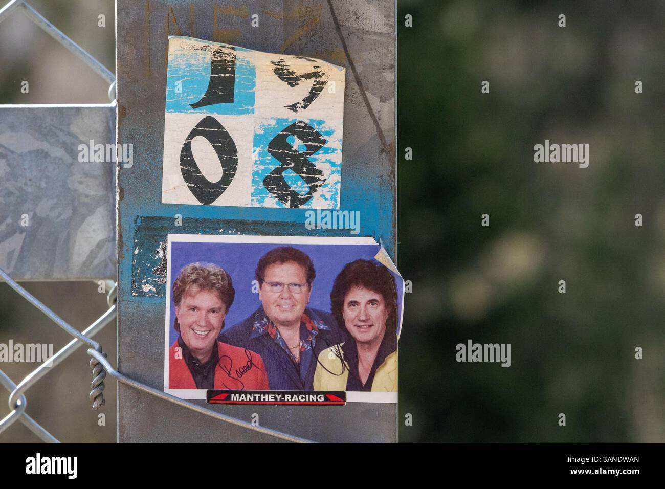 Manthey Racing sticker on a safety barrier at the Nürburgring race ...