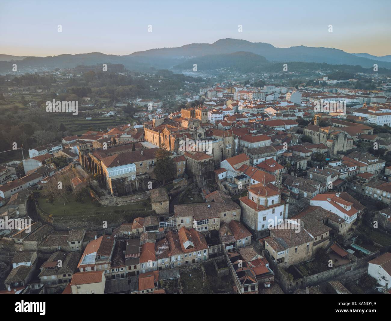 Aerial view of catedral de santa maria de tui and red rooftops in the ...