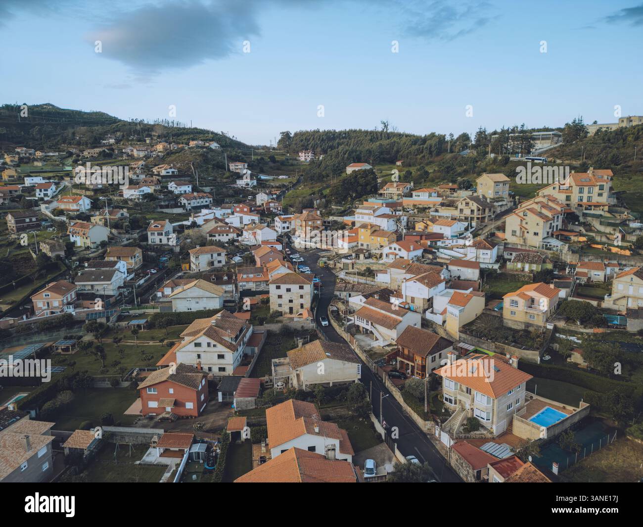 Aerial view of beautiful houses on the hillside in sunset, Baiona ...