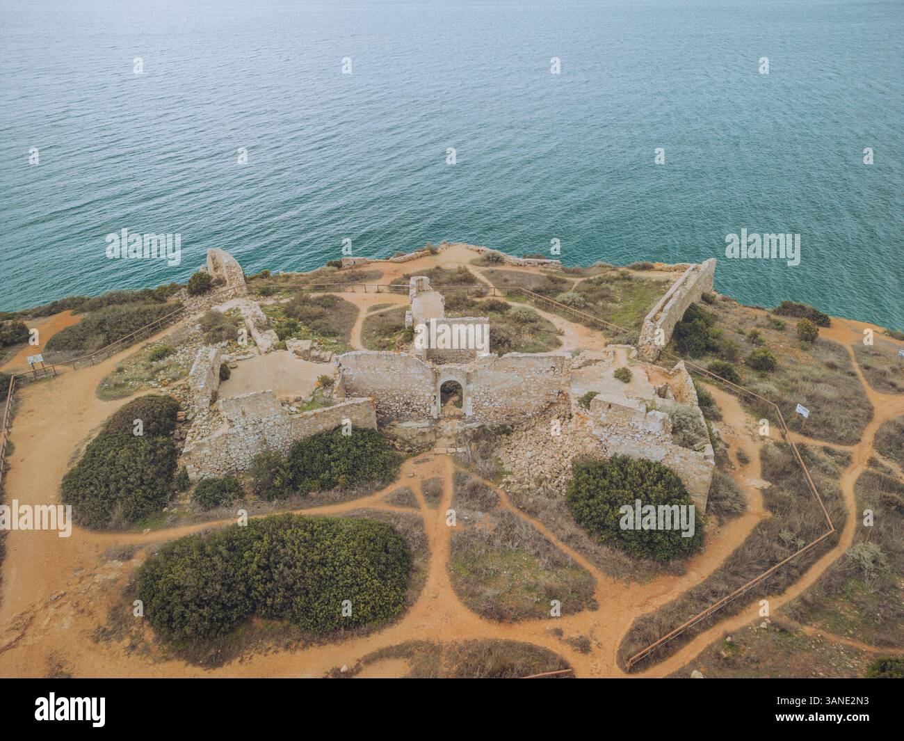 Aerial view of ancient ruins of Forte de Almadena on a rocky cliff by ...