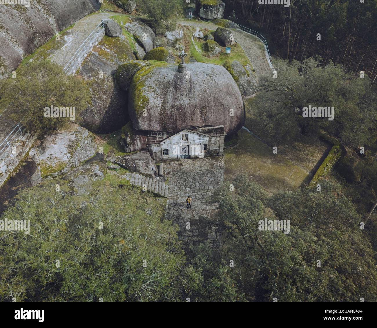 Aerial view of Santuario de Nossa Senhora da Lapa surrounded by forest ...