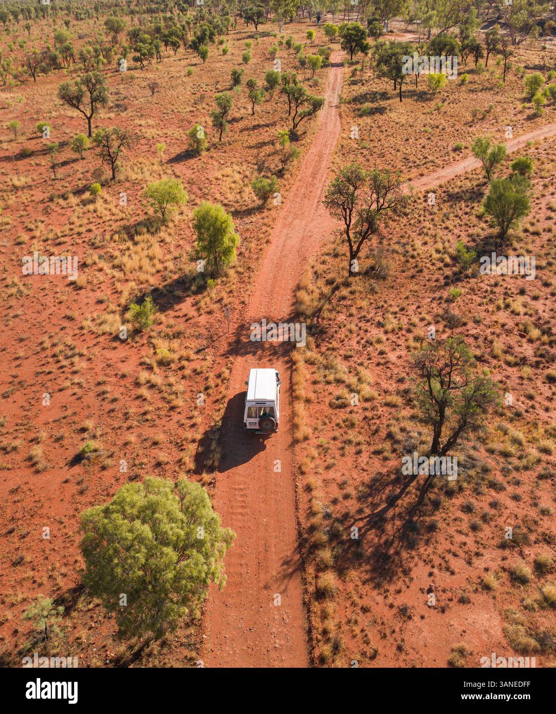 Aerial view of 4x4 truck on off road red dirt track in the outback ...