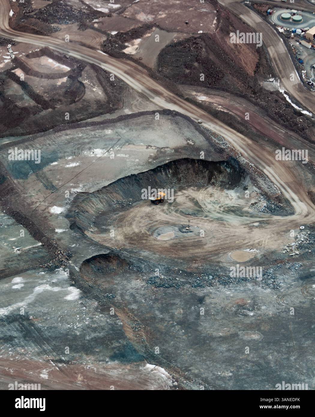 Aerial view of industrial mining operations and machinery with salt ...